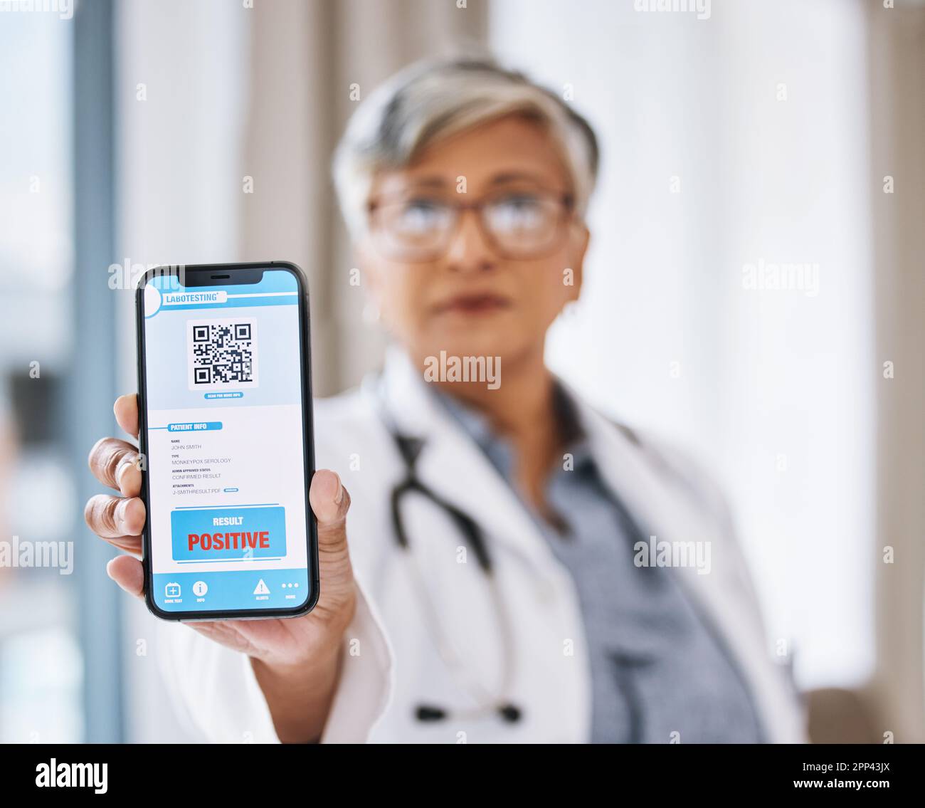 Woman doctor, phone and covid test results with QR code in hand ready ...