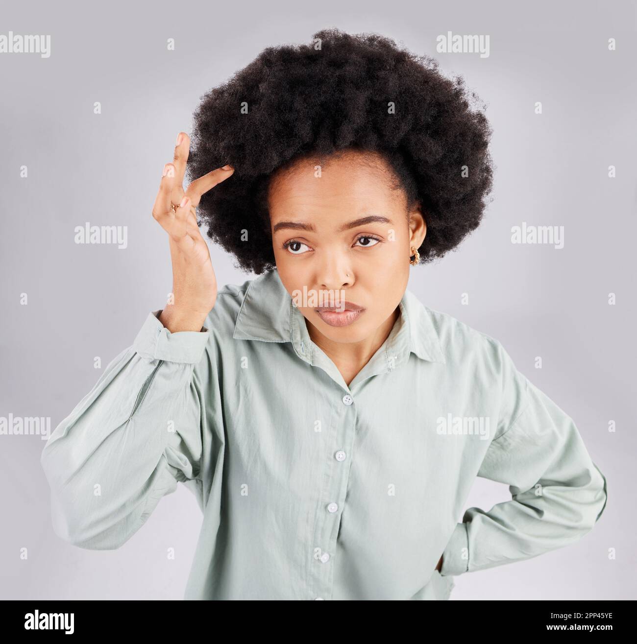 Woman, hair and itching with thinking in studio for skin problem ...