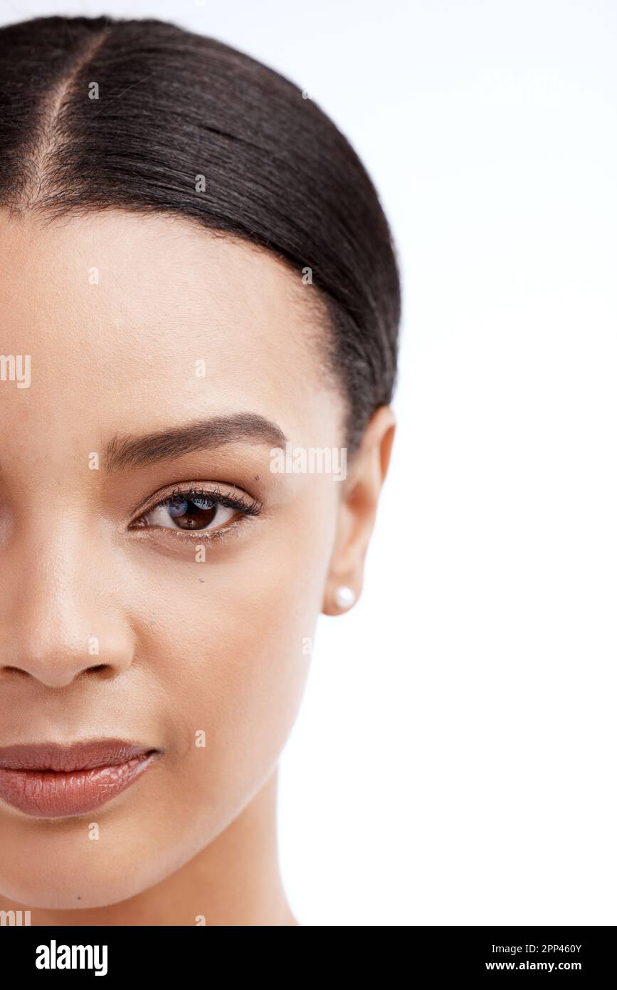 Half face portrait, skincare and woman in studio isolated on a white ...
