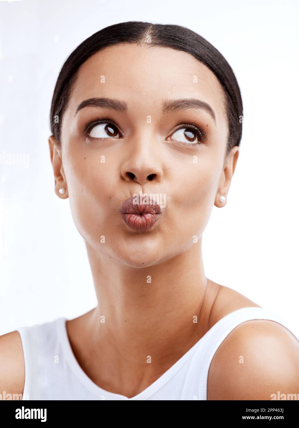 Thinking face, skincare and pout of woman in studio isolated on a white ...