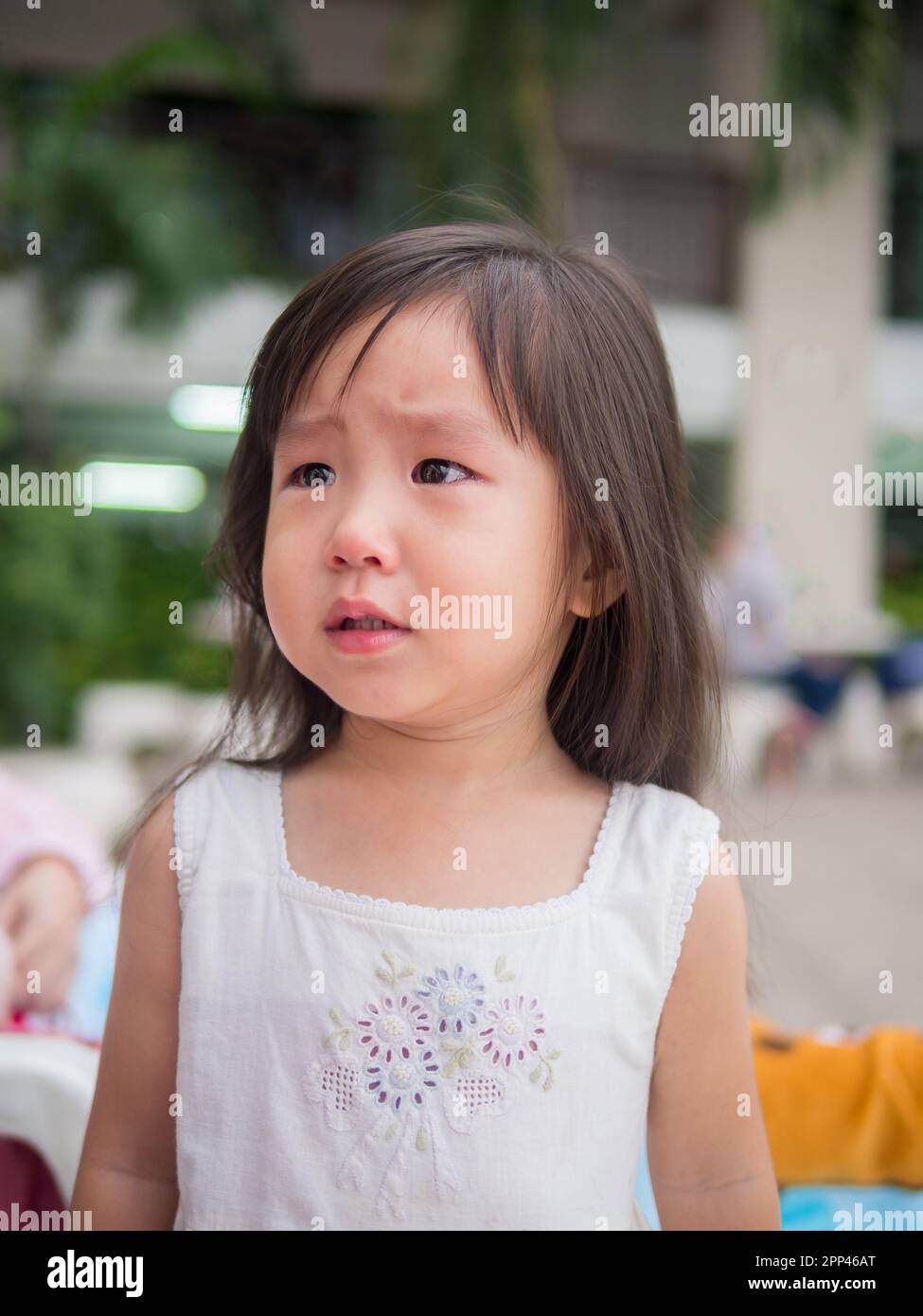 Portrait of a cute little girl , crying action Stock Photo - Alamy