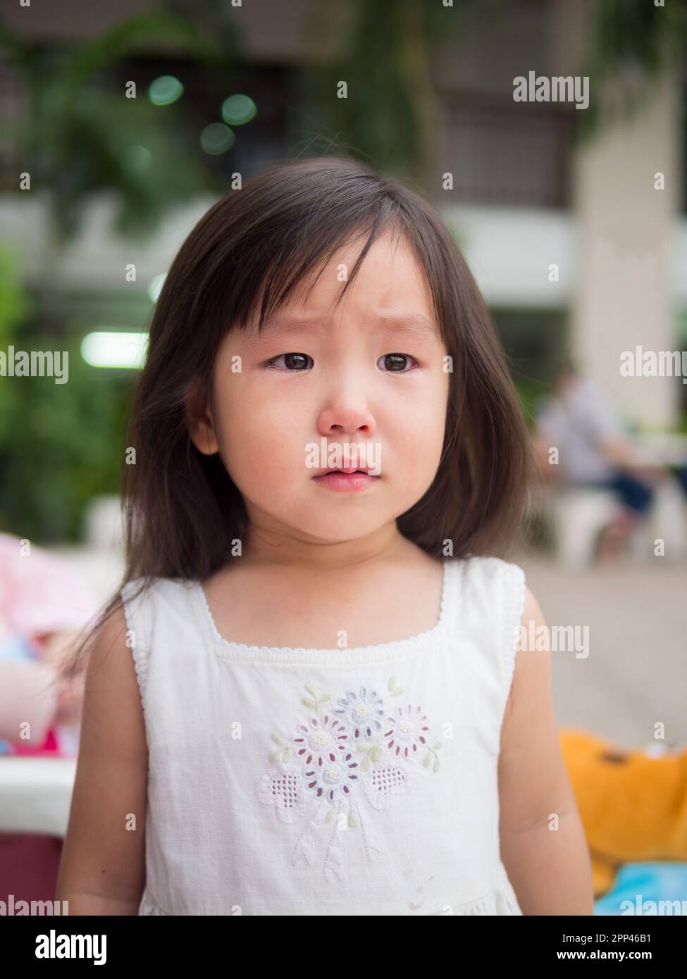 Portrait of a cute little girl , crying action Stock Photo - Alamy