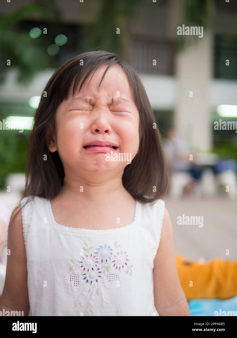 Portrait of a cute little girl , crying action Stock Photo - Alamy