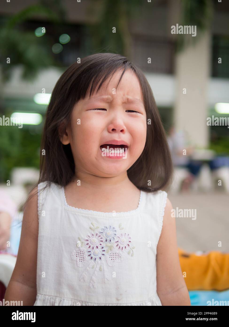 Portrait of a cute little girl , crying action Stock Photo - Alamy