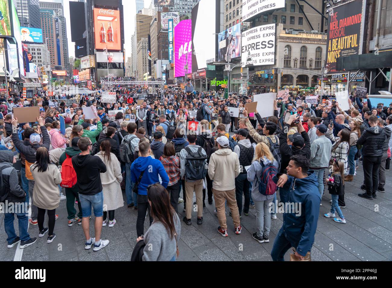 New York, United States. 21st Apr, 2023. A crowd of protesters holds ...