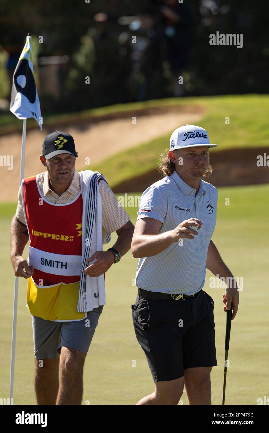 Captain Cameron Smith of Ripper GC putts on the ninth hole during the ...