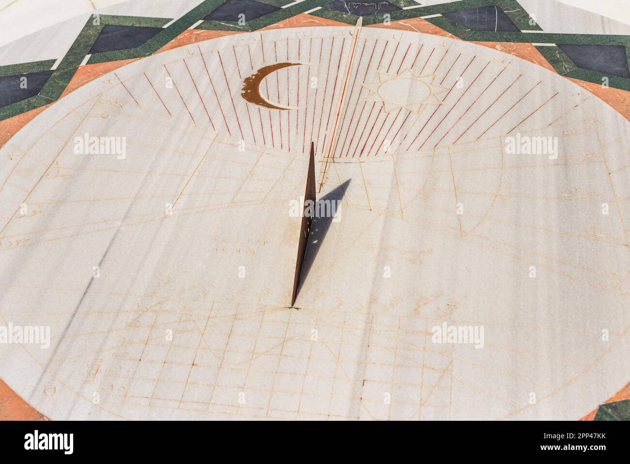 Shot of the arabic outdoors sun clock Stock Photo - Alamy