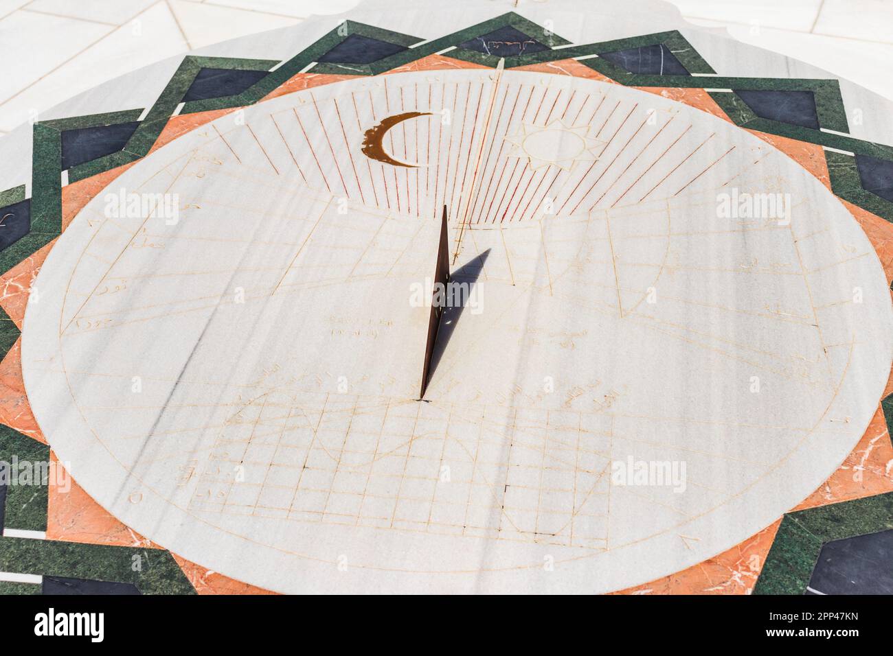 Shot of the arabic outdoors sun clock Stock Photo - Alamy