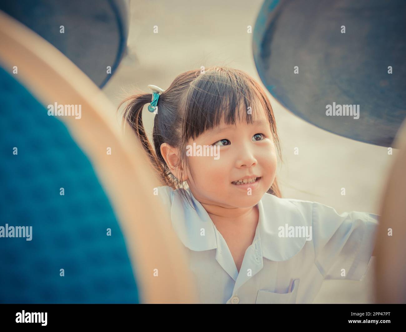 Happy kid, asian baby child in school uniform playing on playground ...