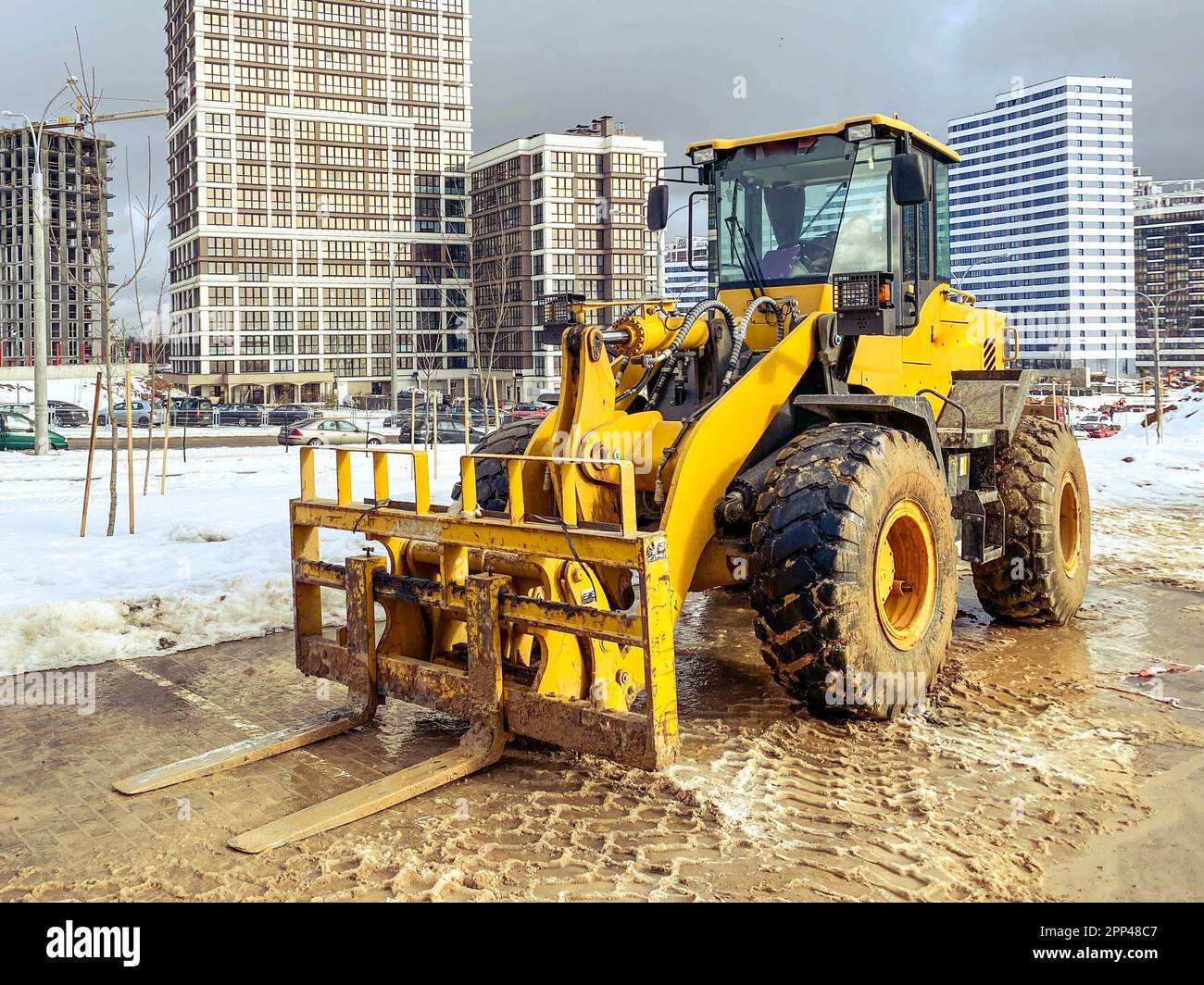 construction equipment on site. construction of houses. bright, yellow ...
