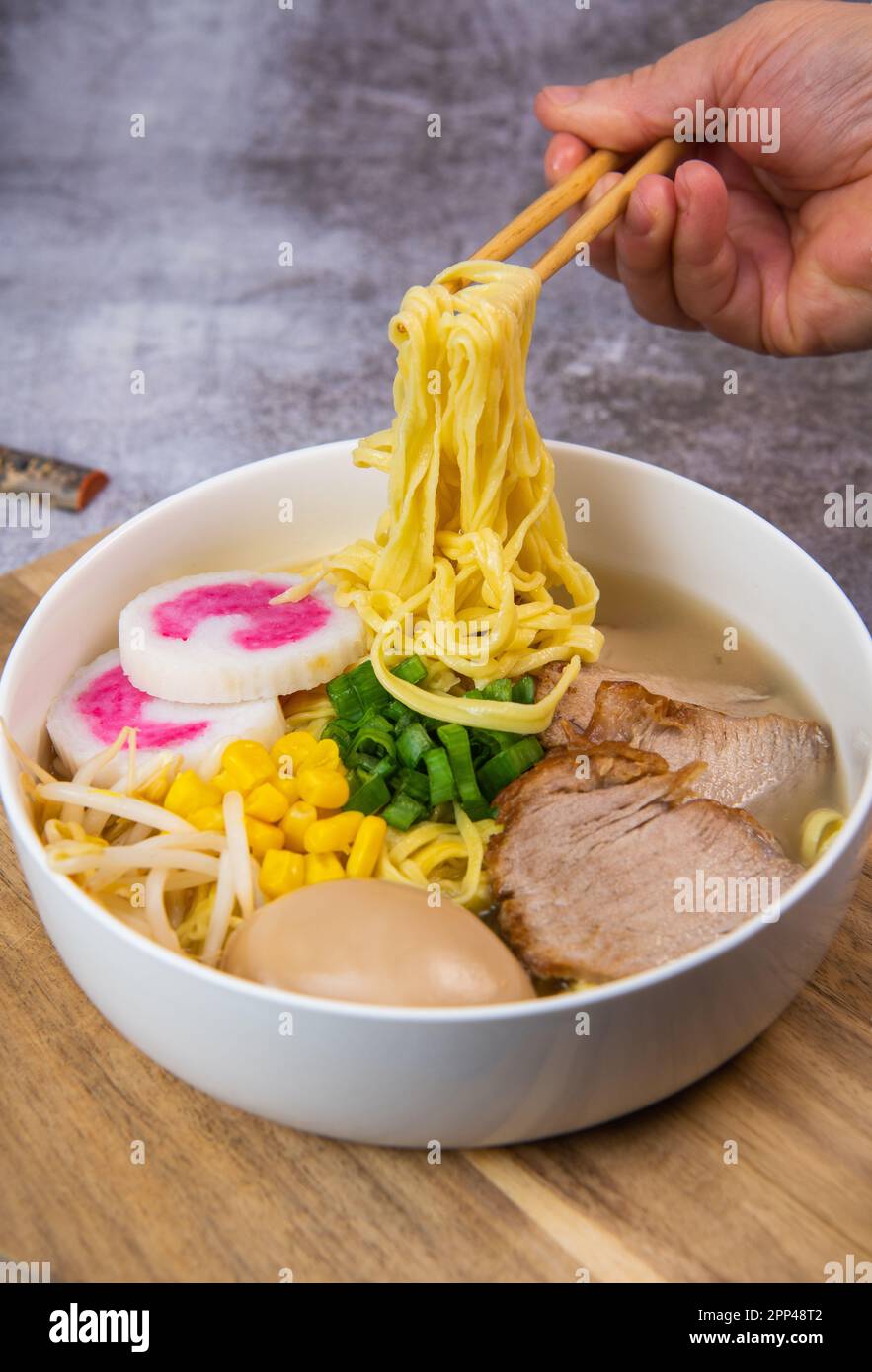 Fresh ramen noodles with garnish, pork tenderloin, eggs marinated in ...