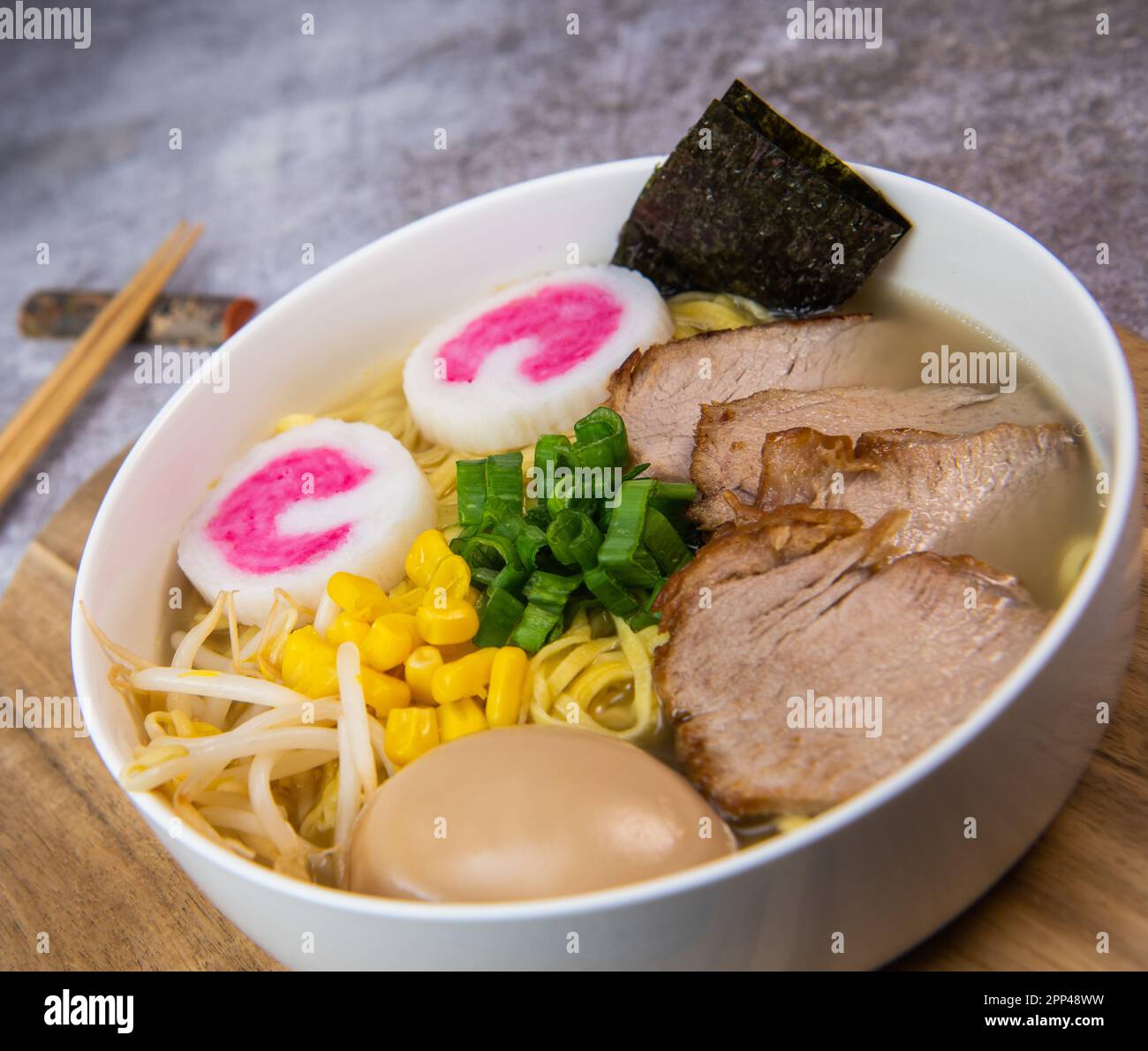Fresh ramen noodles with garnish, pork tenderloin, eggs marinated in ...