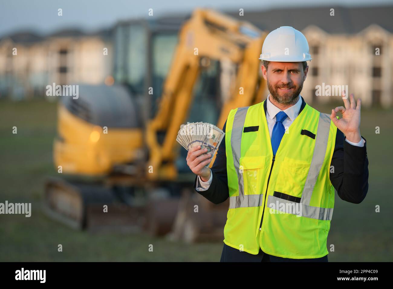 inspector man with money budget wearing helmet, ok. photo of inspector ...