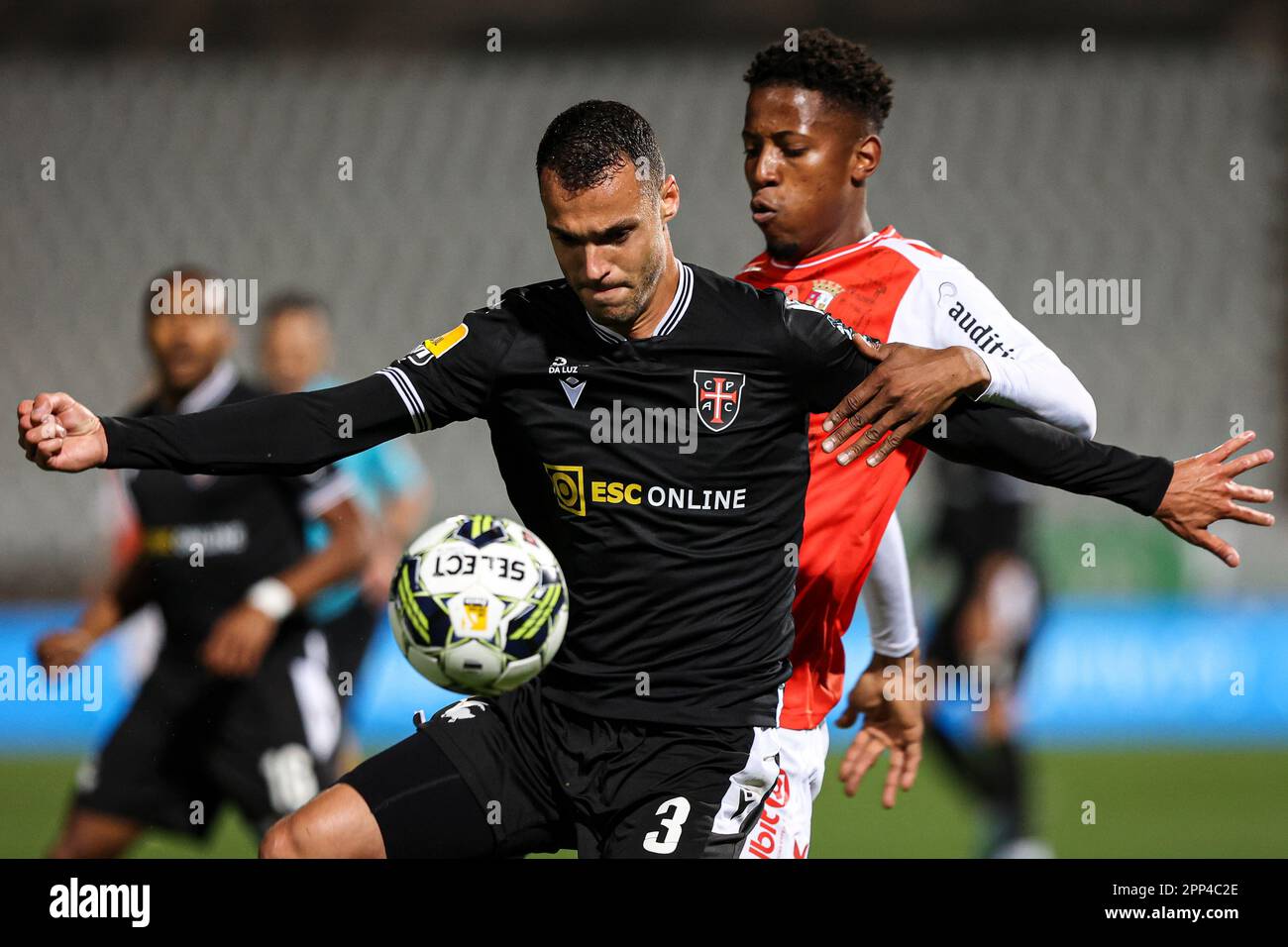 Oeiras, Portugal. 21st Apr, 2023. Simon Banza of SC Braga (R) with João ...