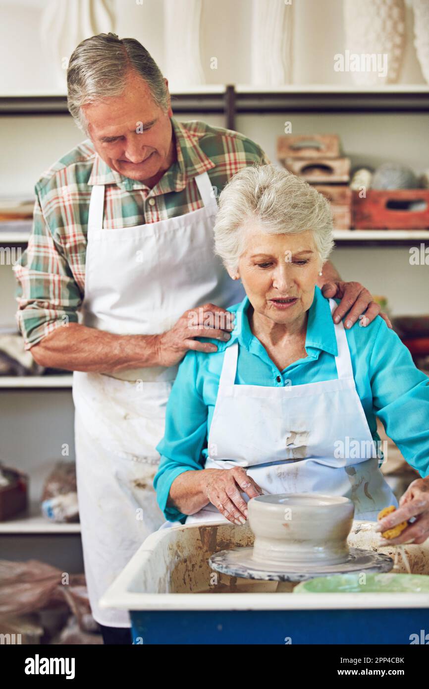 Theyve moulded the perfect marriage. a senior couple making a ceramic ...