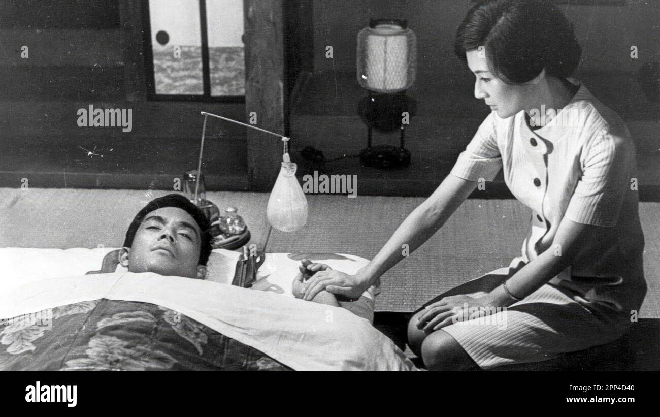 YUZO KAYAMA and YOKO TSUKASA in SCATTERED CLOUDS (1967) -Original title: MIDAREGUMO-, directed ...
