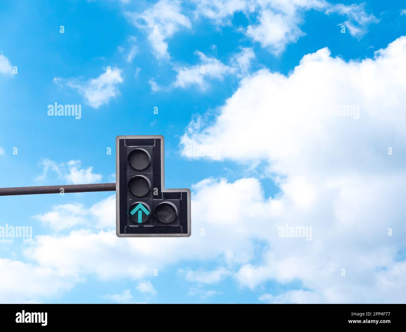 Green color on the traffic light with a beautiful blue sky in ...