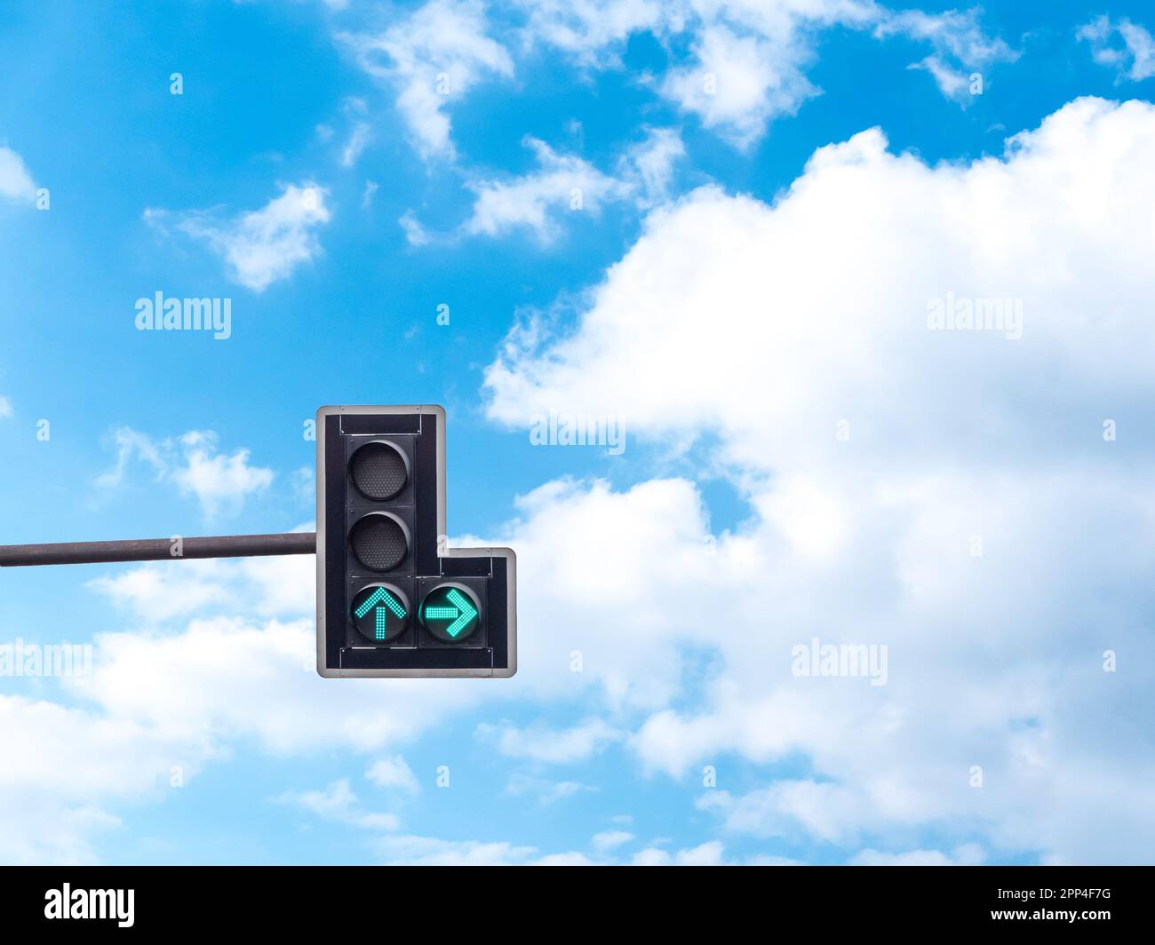Green color on the traffic light with a beautiful blue sky in ...