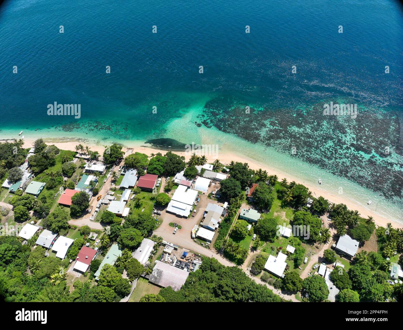 Aerial view of lush island showing tropical lving in the Torres Strait ...