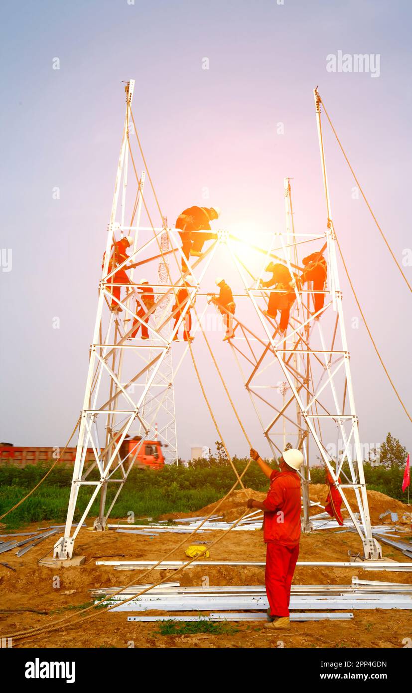 Electrical towers workers hi-res stock photography and images - Alamy