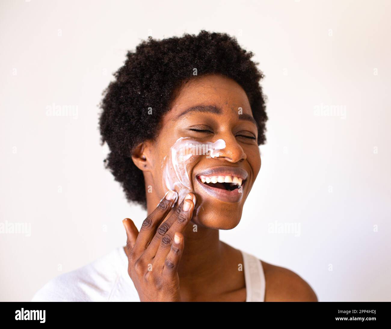 African girl face care Stock Photo - Alamy
