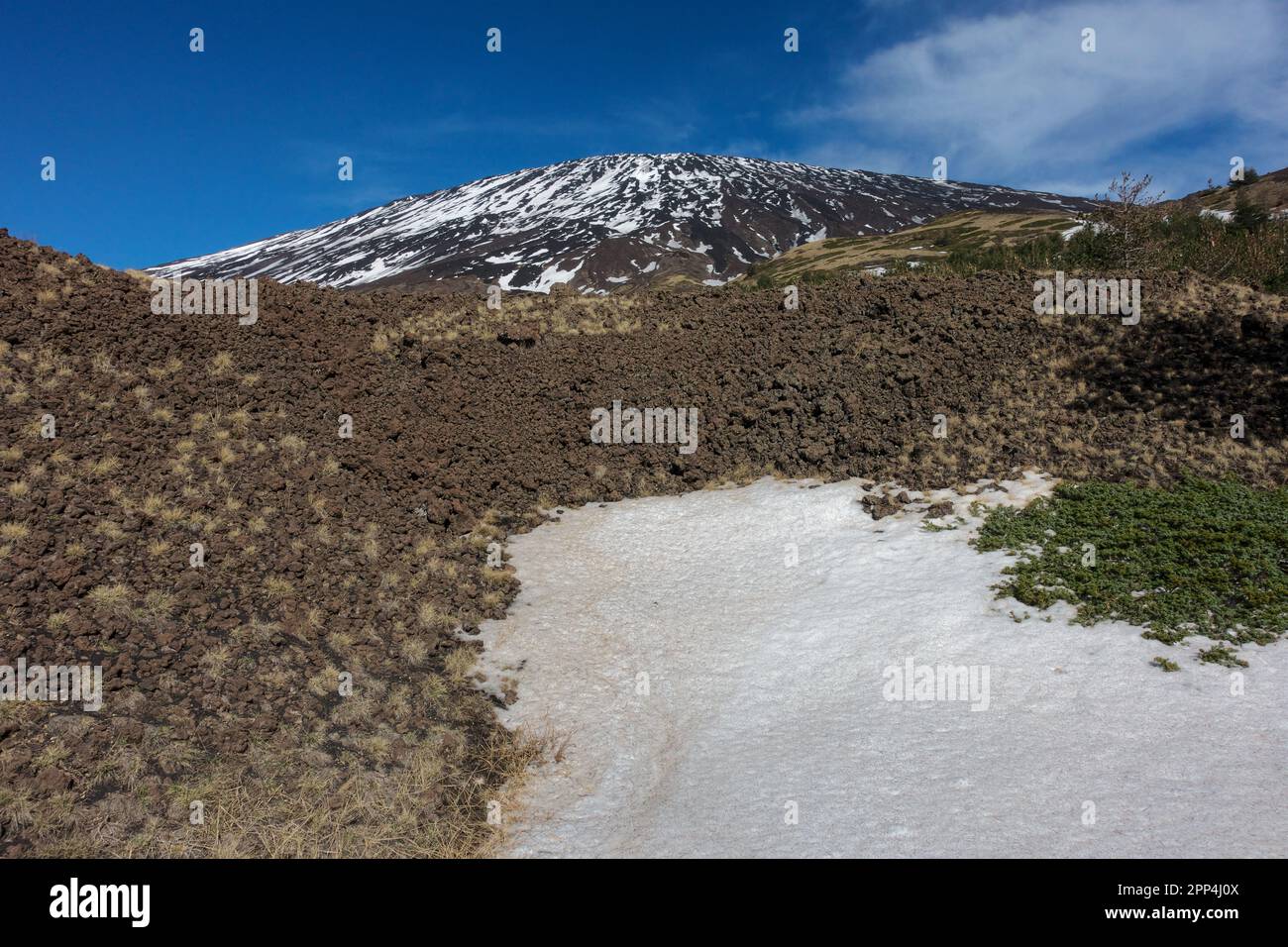 rocky soil landscape and Mount Etna in National Park of Sicily, Italy ...