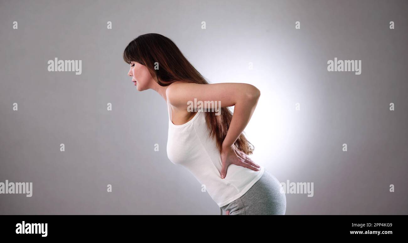 Bad Posture Back Pain. Lumbago Spine Ache Stock Photo - Alamy