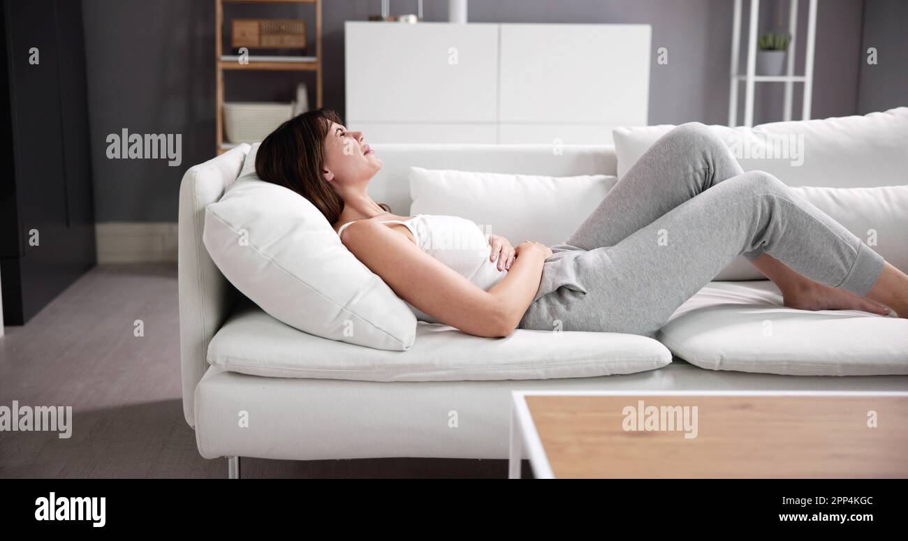 Women PMS Stomach Pain And Digestion Problem Stock Photo - Alamy