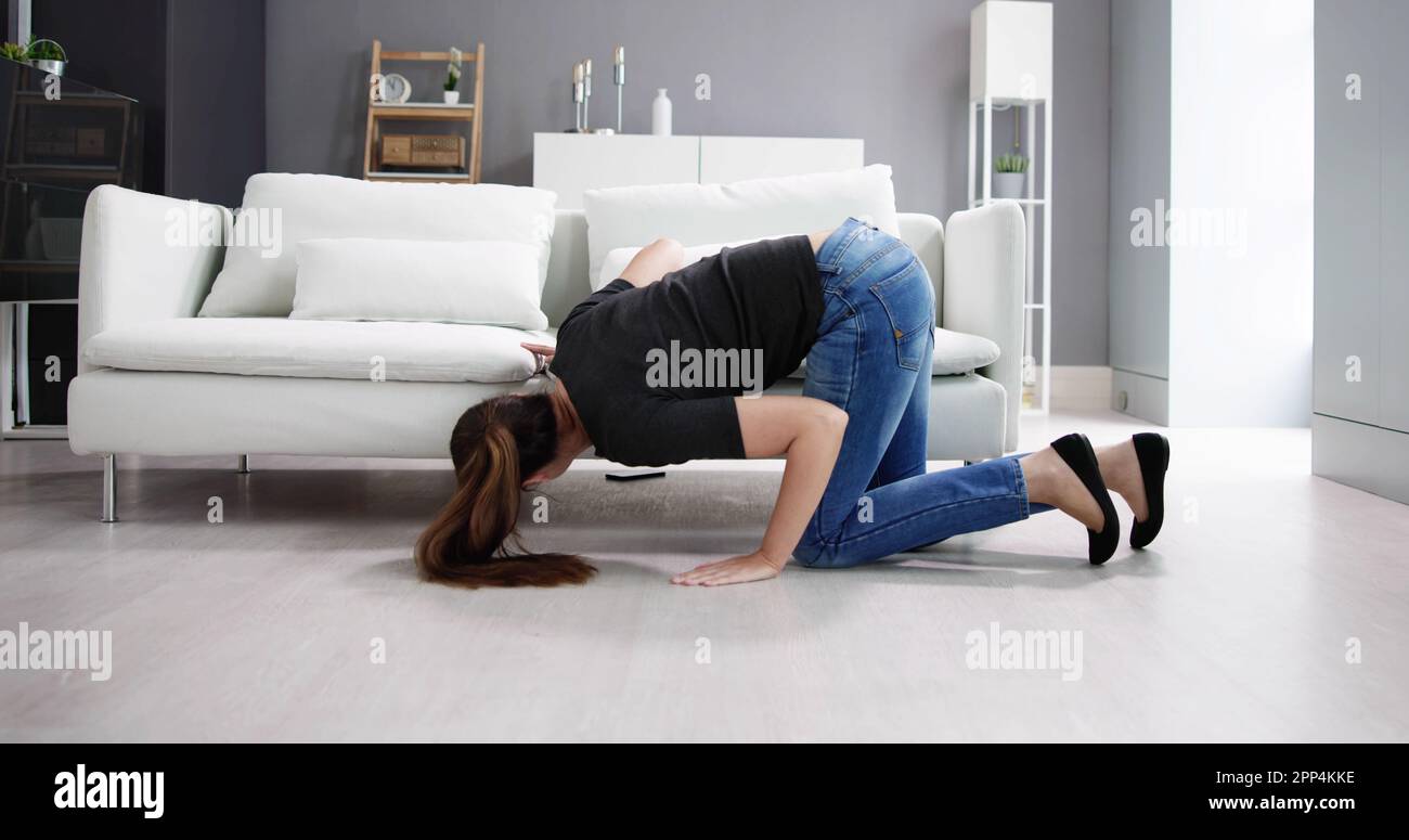 Sofa and searching lost remote control hi-res stock photography and ...