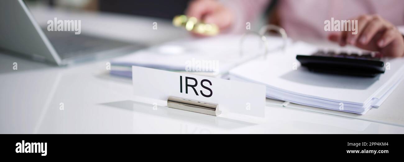 Irs Tax Audit. Auditor Doing Debt Fraud Inspection Stock Photo - Alamy
