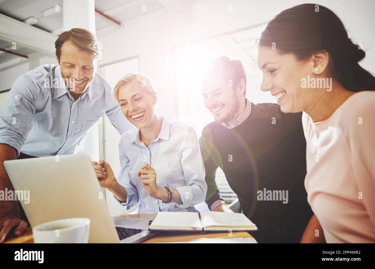 Getting it done through teamwork. a group of businesspeople in the ...