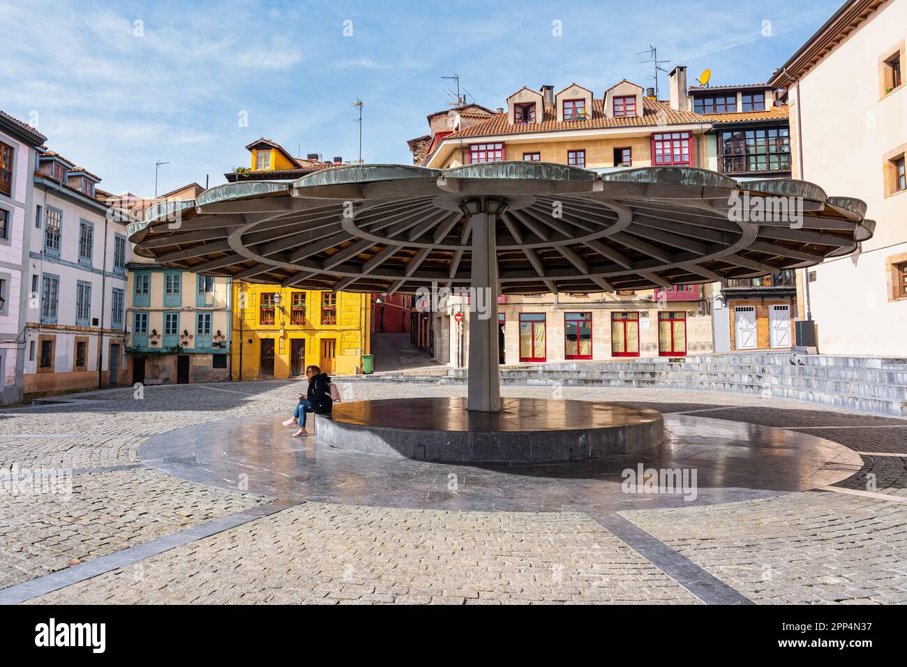 The Umbrella Square with picturesque buildings of striking colors in ...