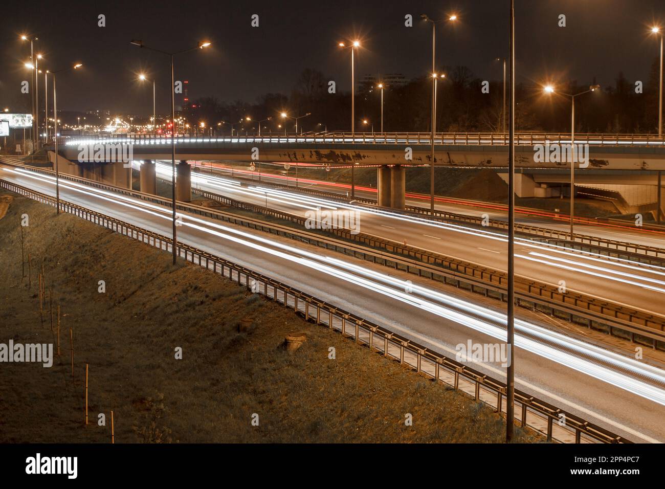 highway intersection by night with lights blurred Stock Photo - Alamy