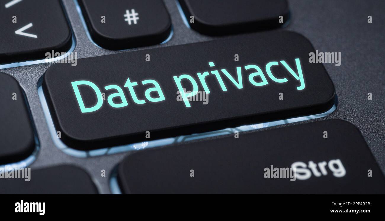 Illuminated keyboard with a labeled key - Data privacy Stock Photo - Alamy