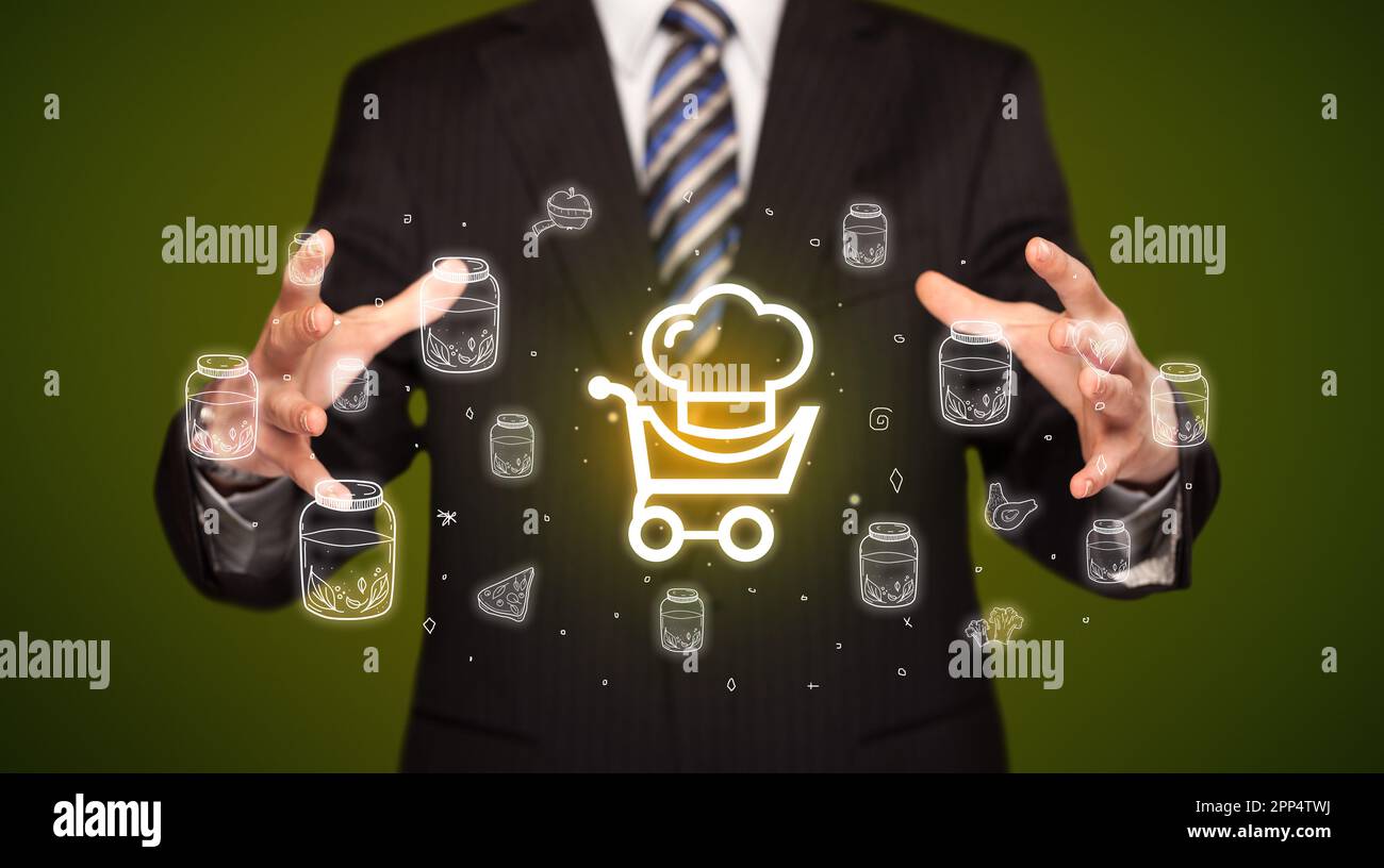 Hand holding food related icons Stock Photo - Alamy