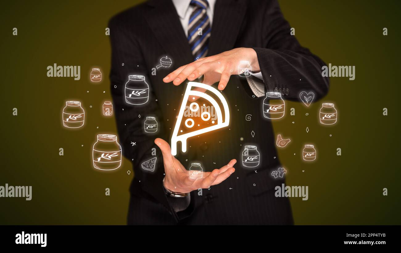 Hand holding food related icons Stock Photo - Alamy
