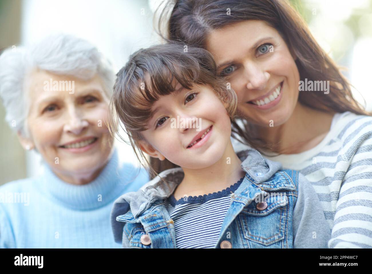 Family over everything. Portrait of a three generational family sitting ...