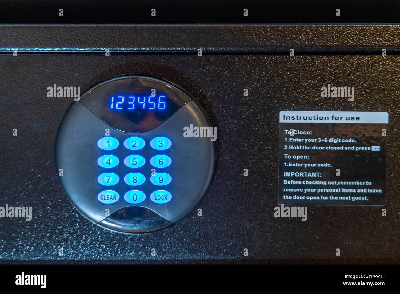 Room safe in a hotel, keypad for entering a 6-digit numerical code to ...