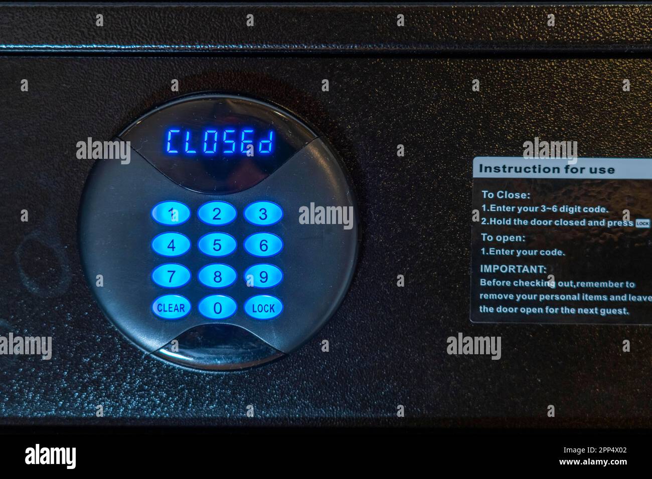 Room safe in a hotel, keypad for entering a 6-digit numerical code to ...