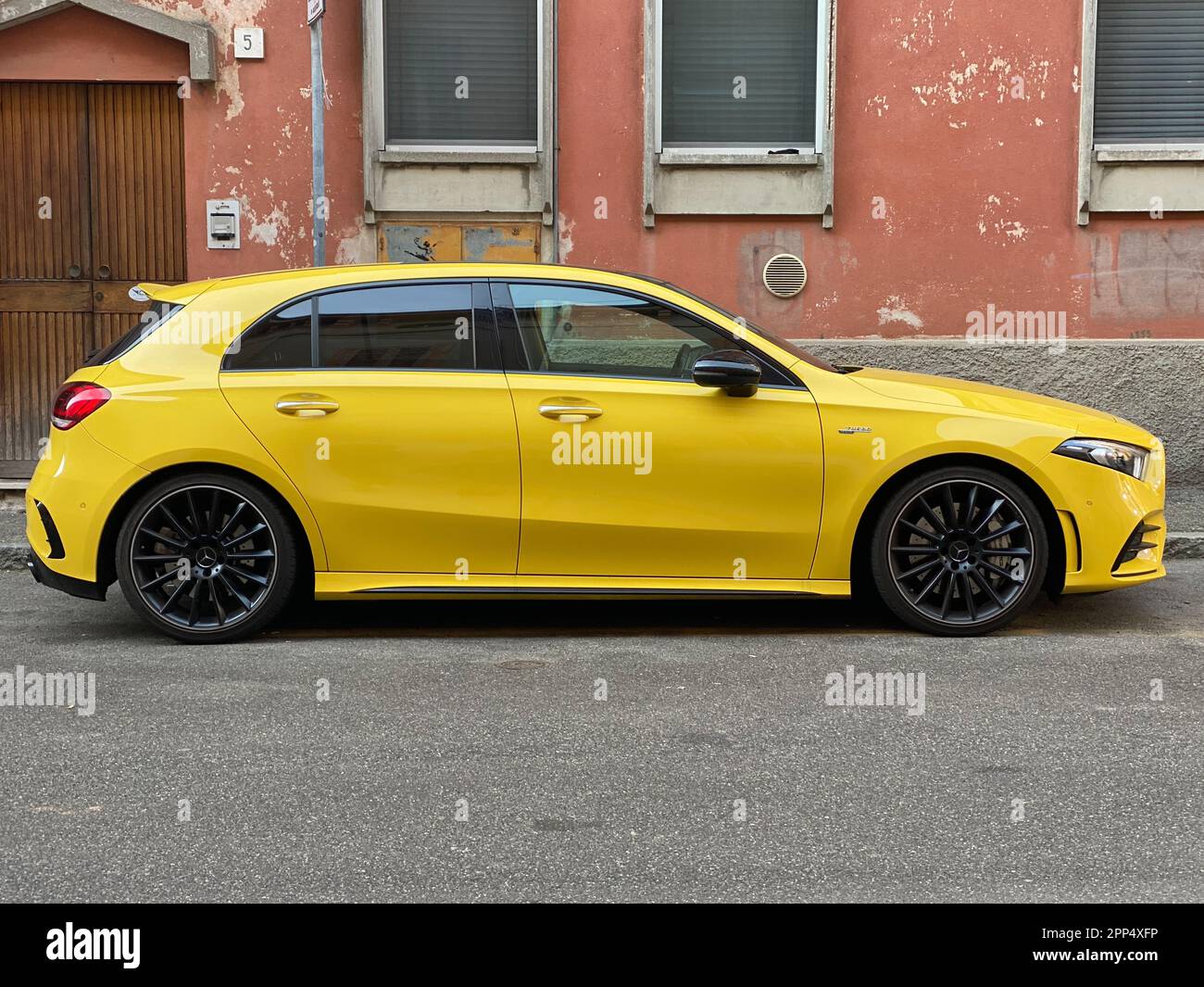 Cremona, Italy - April 2023 Mercedes Benz A class AMG yellow german ...