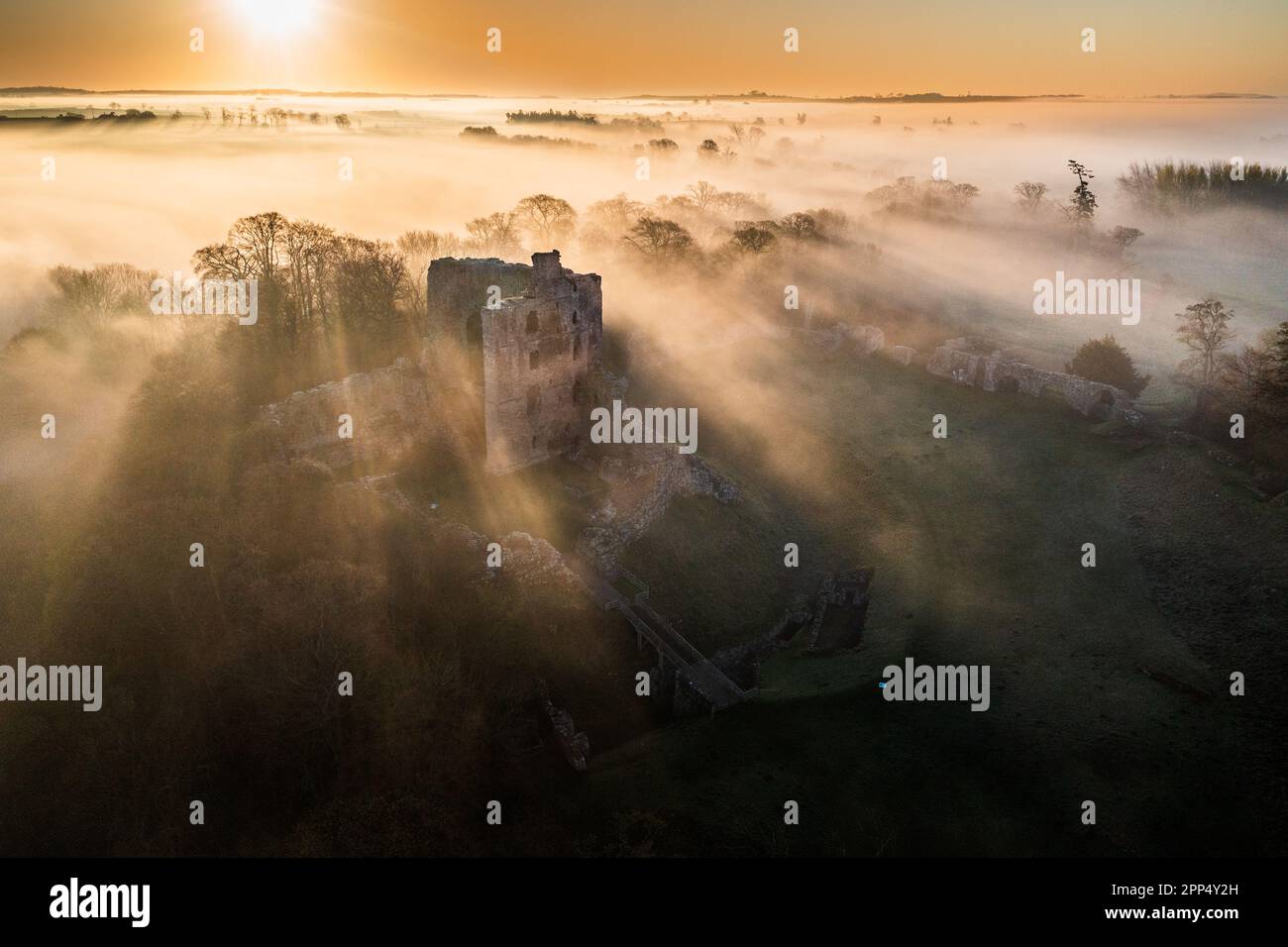 Norham Castle shrouded in early morning mist, during the Scottish Wars ...