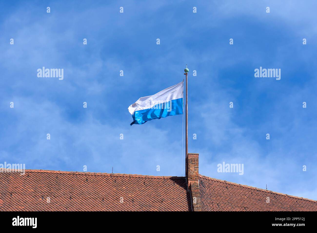 Waving Bavarian flag on the roof of the Kaiserburg, Nuremberg, Middle ...