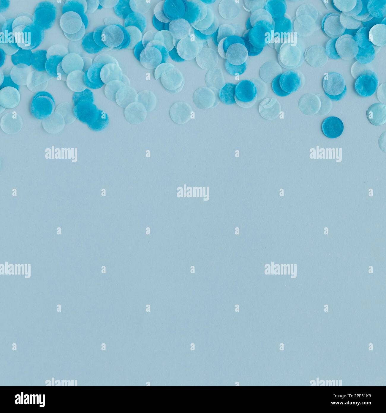 Blue confetti hi-res stock photography and images - Alamy
