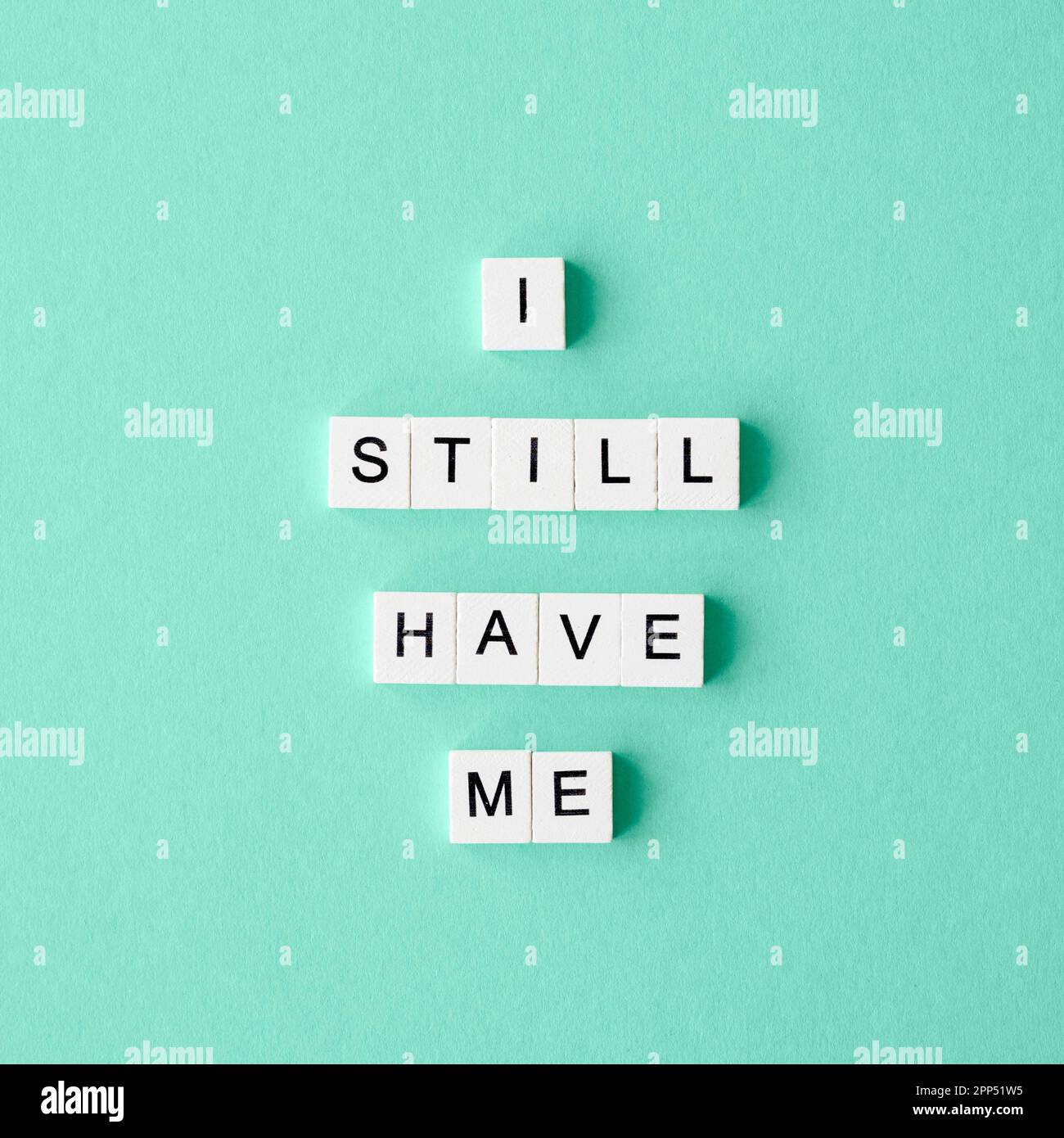 Top view letter cubes green background Stock Photo - Alamy