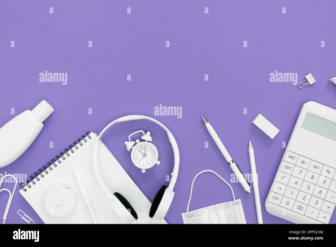 Supplies school with purple background Stock Photo - Alamy