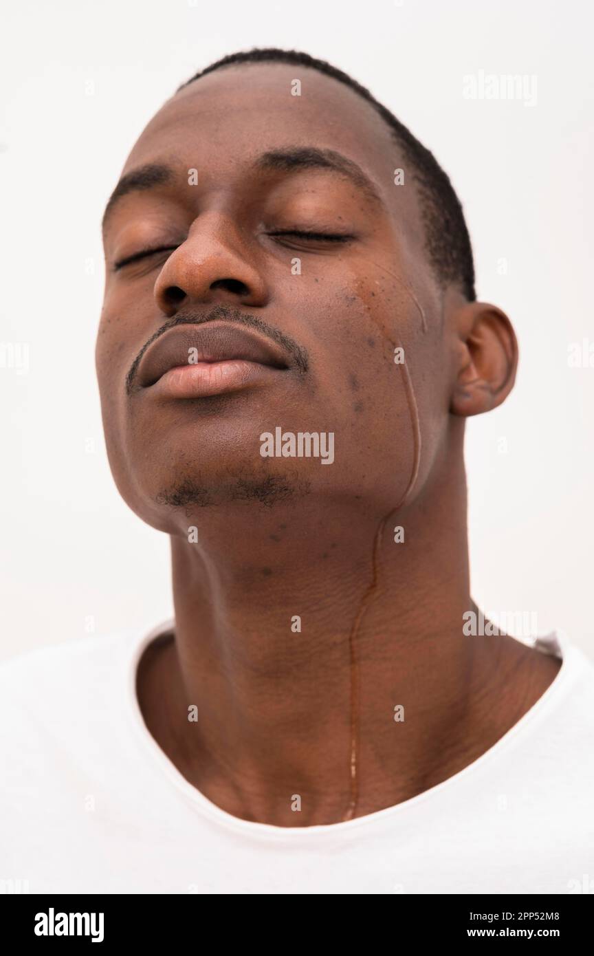 Front view black man crying Stock Photo - Alamy