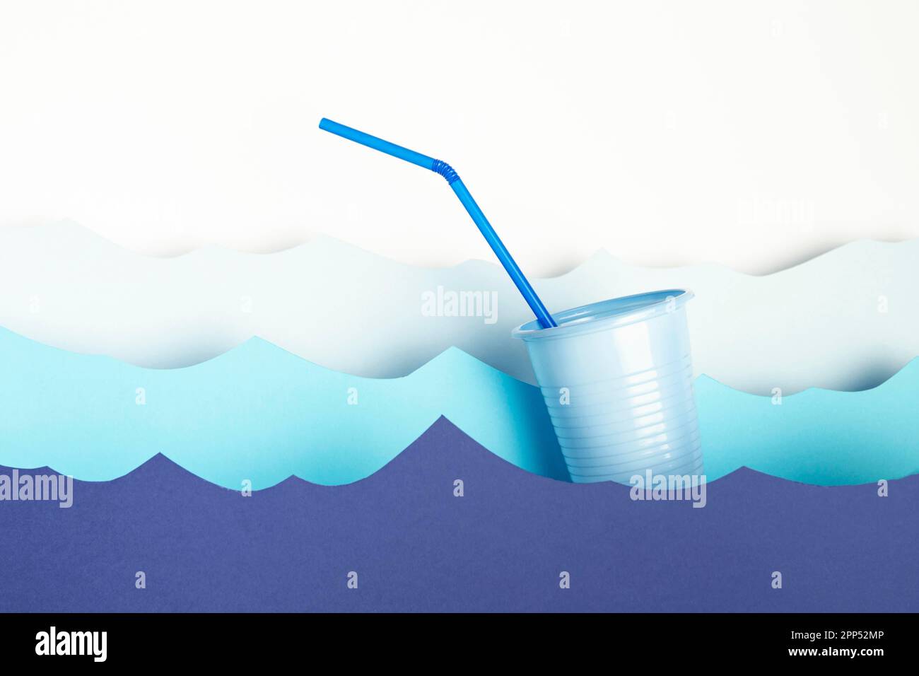 Front view plastic cup with straw paper waves Stock Photo - Alamy