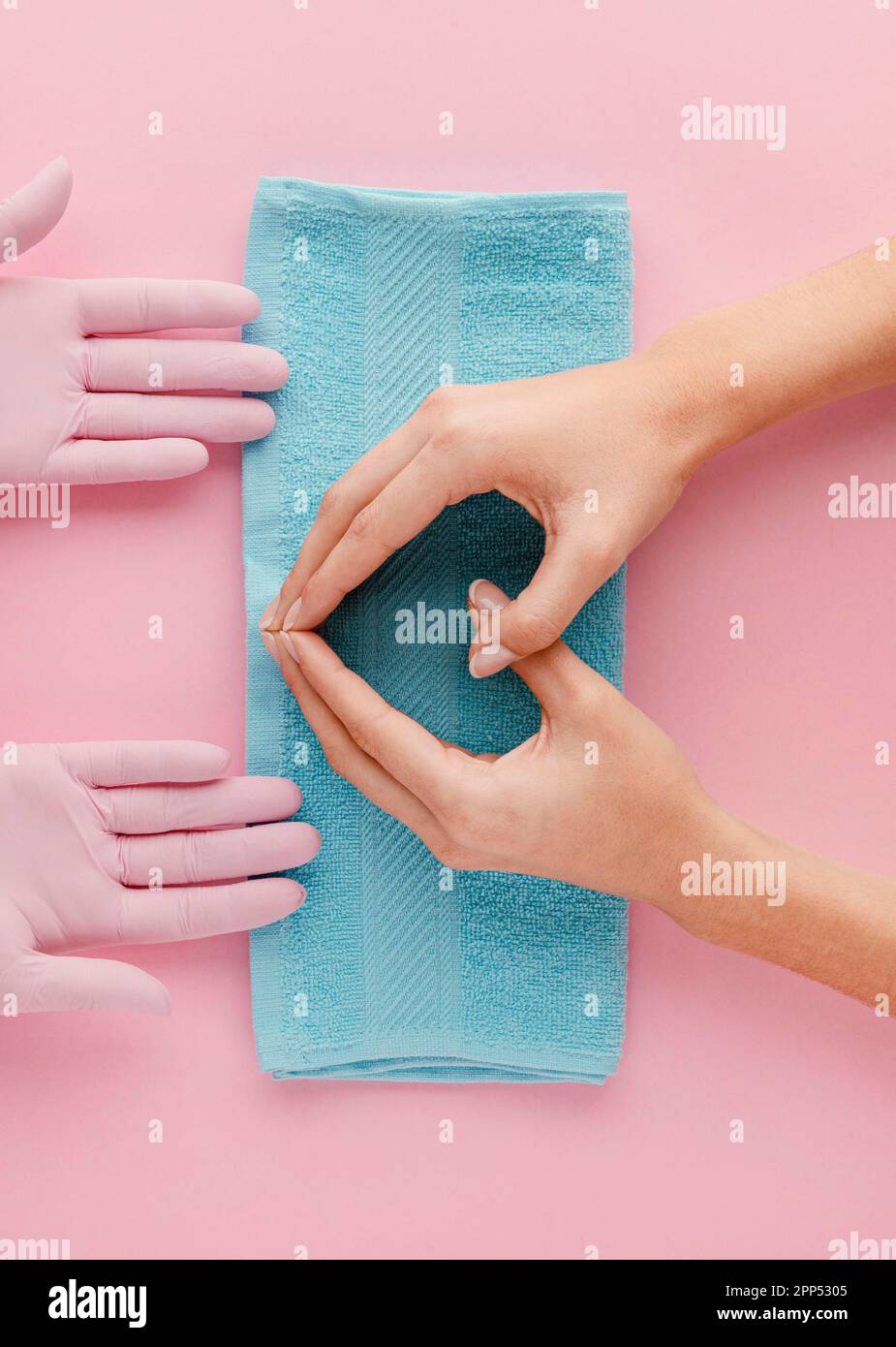 Hands blue hi-res stock photography and images - Alamy