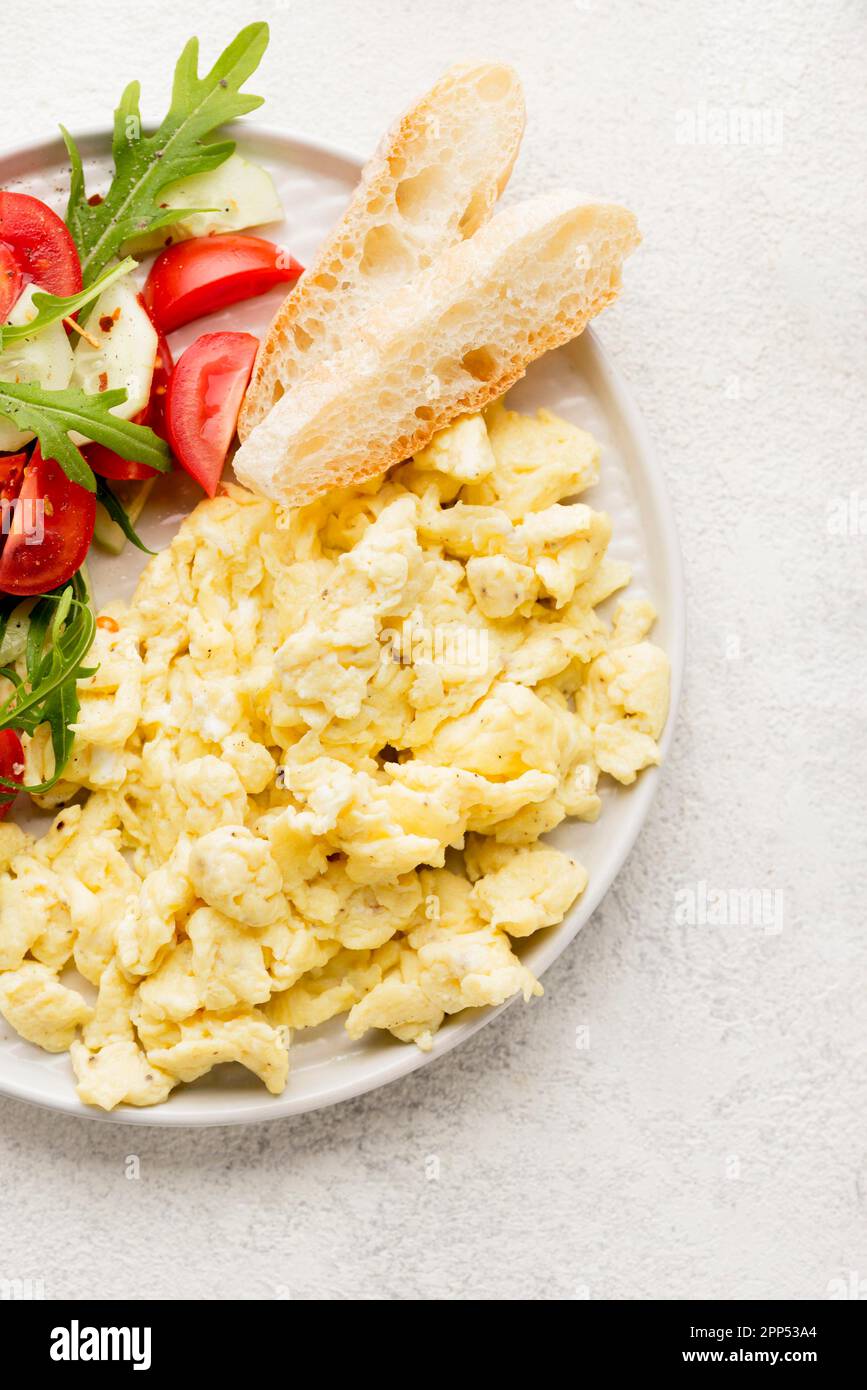 Top view scrambled eggs with copy space Stock Photo - Alamy