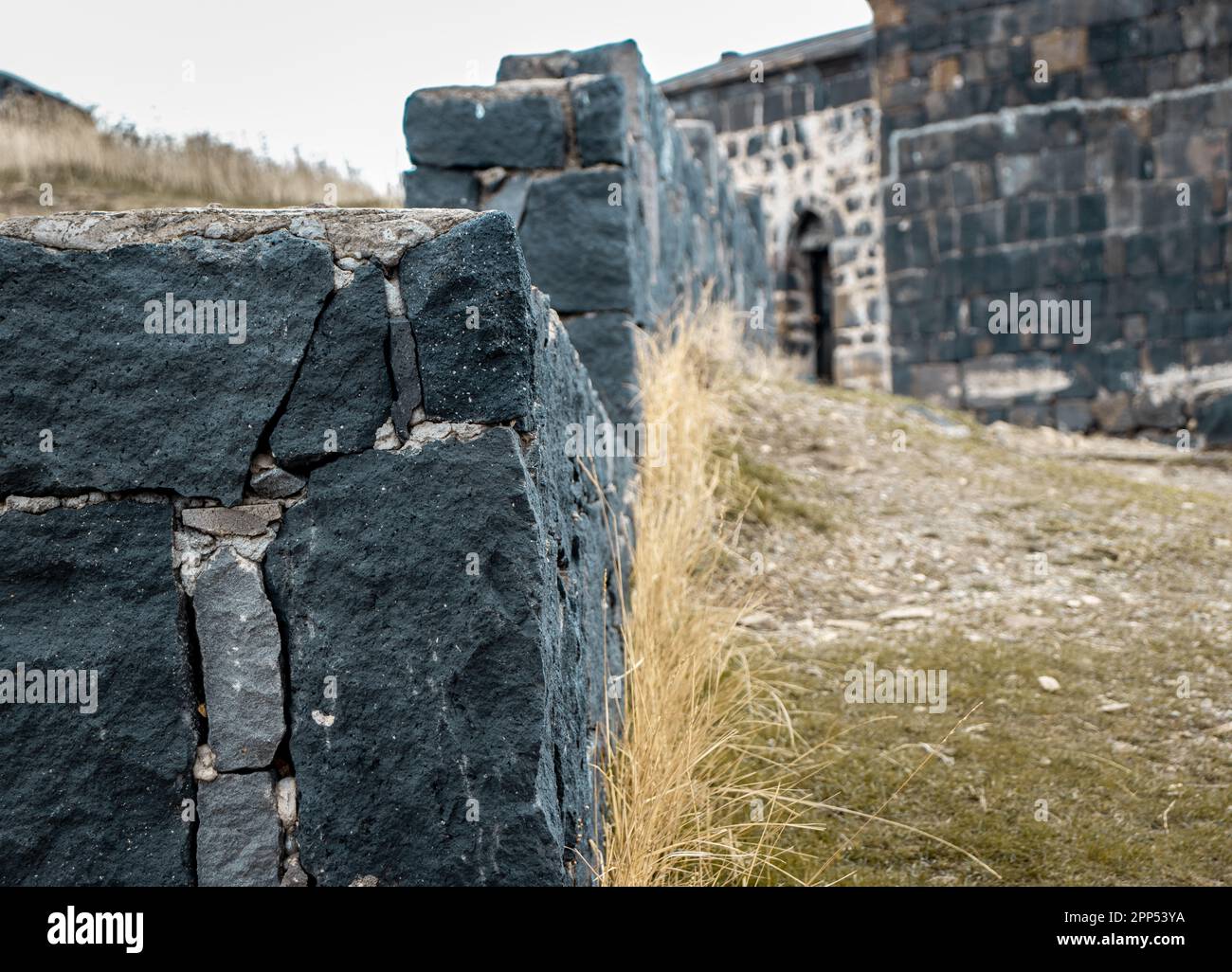 Close up fence stone wall surface with cement on yard concept photo ...